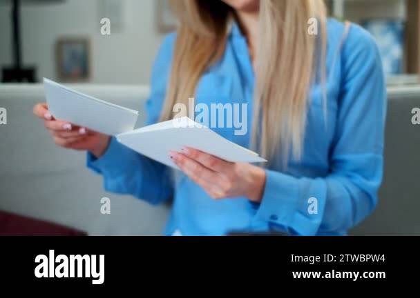 Close-up of happy girl viewing her old photos, memories of childhood ...