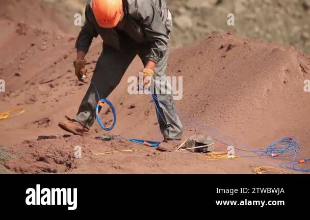 Preparation of an explosion in the quarry, workers are preparing ...