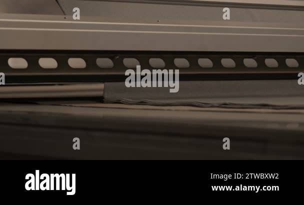 The printing machine prints the code on the paper (fabric) date, time ...