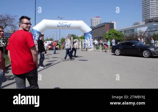 A Bunch Of Mustangs Entering Ford Car Show Stock Video Footage - Alamy