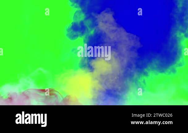Color full smoke slowly floating through space against green screen ...