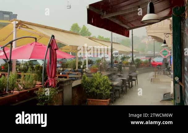 Wet cafe tables Stock Videos & Footage - HD and 4K Video Clips - Alamy