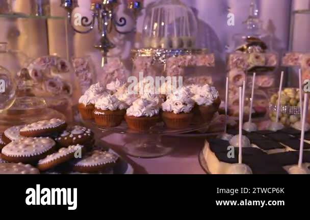 Candy bar in the restaurant, childrens party, a white teddy bear with a ...