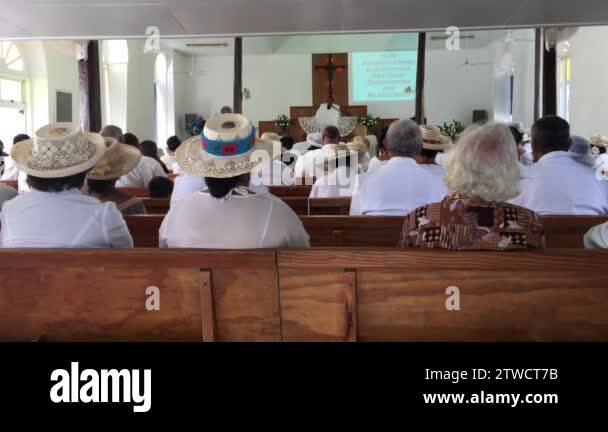 Cook Islanders pray at CICC church.94% of Cook Islanders associated ...