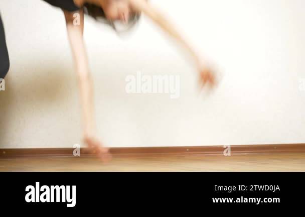 funny girl doing upside down pushups in house. 4k. portrait of a girl ...