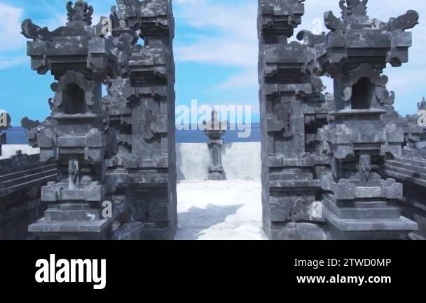 Traditional Bali architecture gates to Hindu temples on blue sea and ...