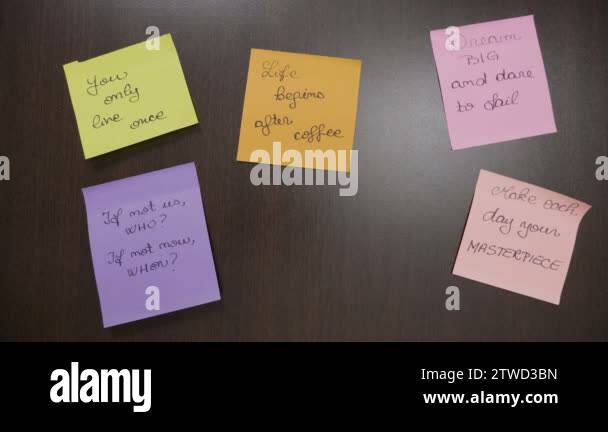 Top view of girl hands with red manicure sticking and unsticking ...