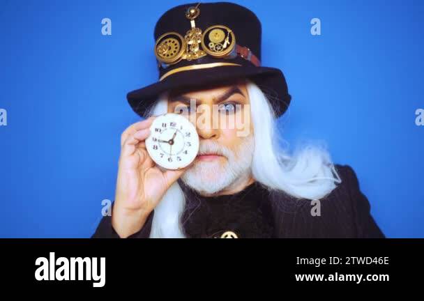 Watchmaker, time keeper, time line. Time wizard. Old man with watch ...