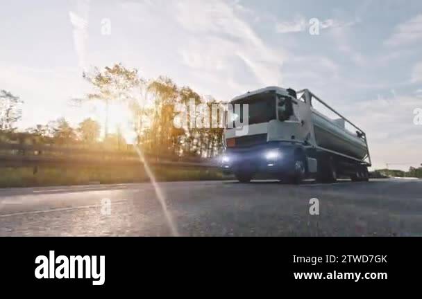 Cargo truck with fuel diesel cargo trailer driving on a highway. White ...