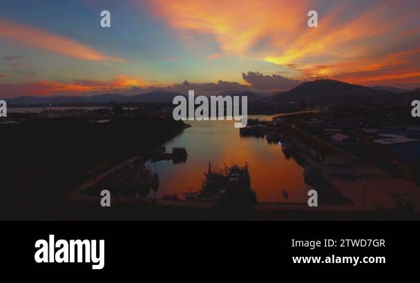 aerial scenery sunset at Siray fishing port. Phuket Fishing Port is the ...