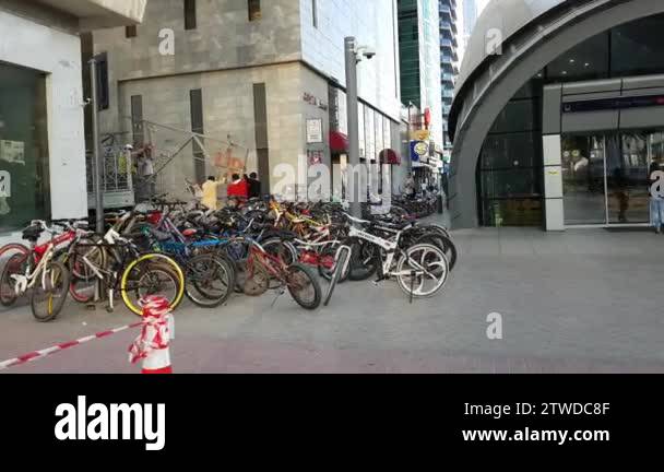 Bicycle parking at the entrance to Burj Khalifa Dubai Mall Metro Station. Dubai, UAE Stock Video ...