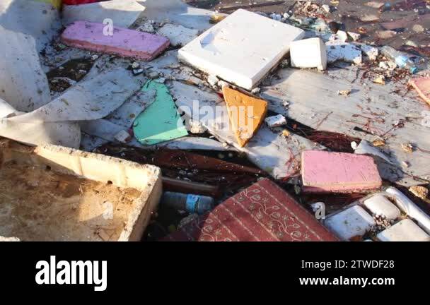 Trash and garbage floating on the surface of the water. Water pollution ...