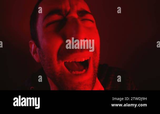 Man is choking and grabbing his neck with his hands Stock Video Footage ...