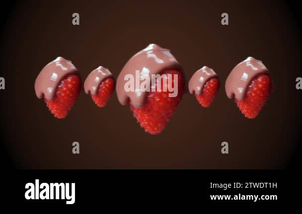 Isolated strawberries on brown background are spinning and poured by ...