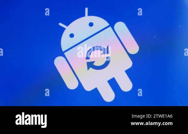Android robot logo icon on the Samsung smart phone screen during update ...