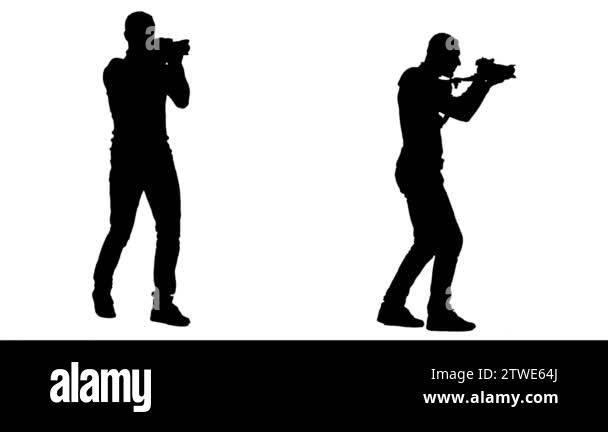 Filmmaker steps with the camera on his shoulder. White background ...