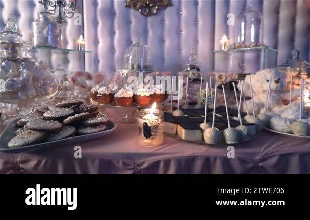 Candy bar in the restaurant, childrens party, birthday, lighted candle ...