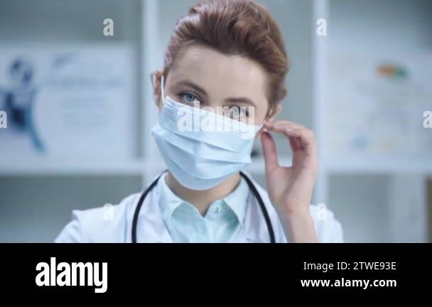 Beautiful doctor taking off medical Stock Videos & Footage - HD and 4K ...