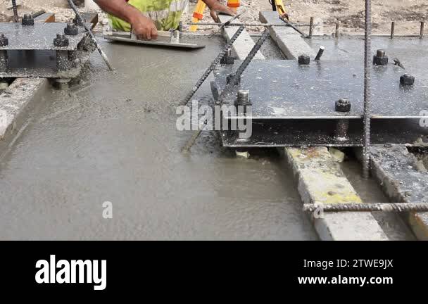 Mason using trowel finish Stock Videos & Footage - HD and 4K Video ...