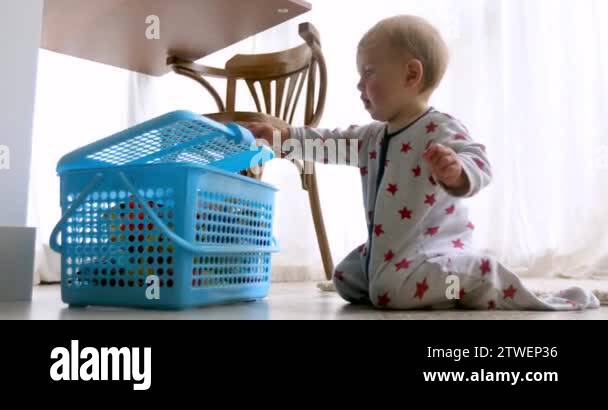 Cute baby opening toy box Stock Video Footage - Alamy