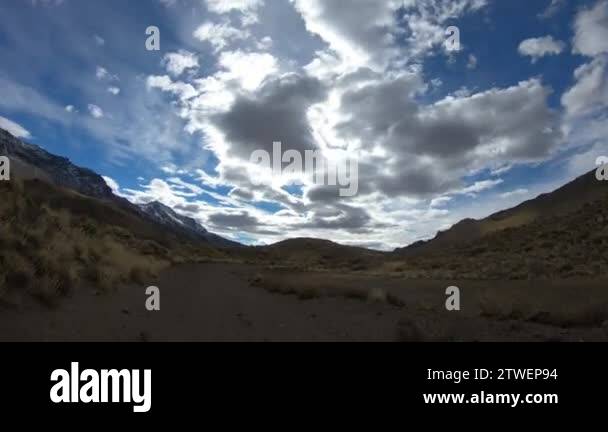 Timelapse scene of gravel street. Camera griped to a car going from hot ...