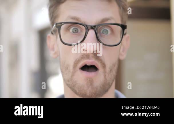 Shocked young man in Stock Videos & Footage - HD and 4K Video Clips - Alamy