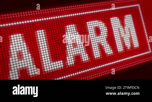 Alarm word on big LED display with large pixels. Bright light warning ...