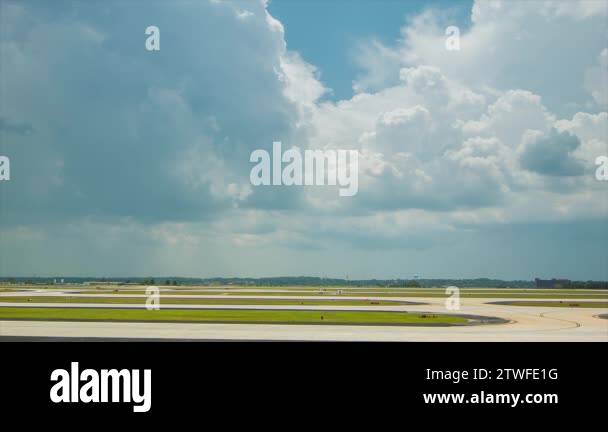 Wide Side View of the Airfield with a Commercial Passenger Airliner ...