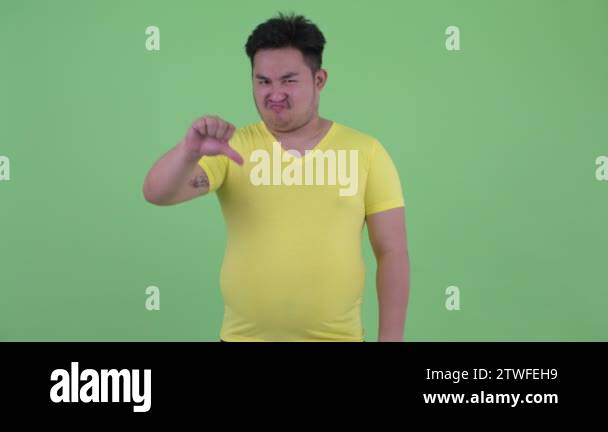 Stressed young overweight asian man Stock Videos & Footage - HD and 4K ...