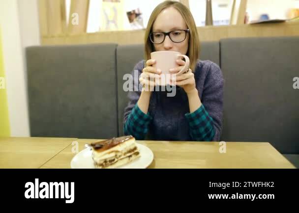 Negative emotion facial expression. Young girl with glasses is unhappy ...