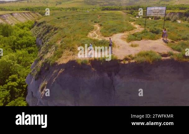 People cliff edge Stock Videos & Footage - HD and 4K Video Clips - Alamy