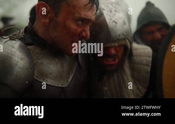 Combat squad of medieval knights of the Crusaders stands in armors with ...