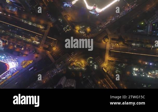 Complex Road Interchange in Shanghai, China at Night. Aerial Vertical ...