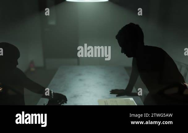 Interrogation room behind one-way mirror glass. Reel to reel recording ...