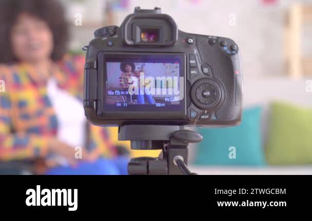 African woman blogger disabled in a wheelchair with an afro hairstyle ...