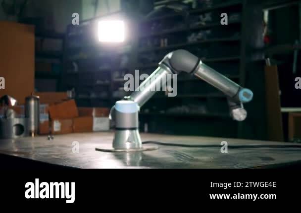 Robotic arm rotates while working at a plant Stock Video Footage - Alamy