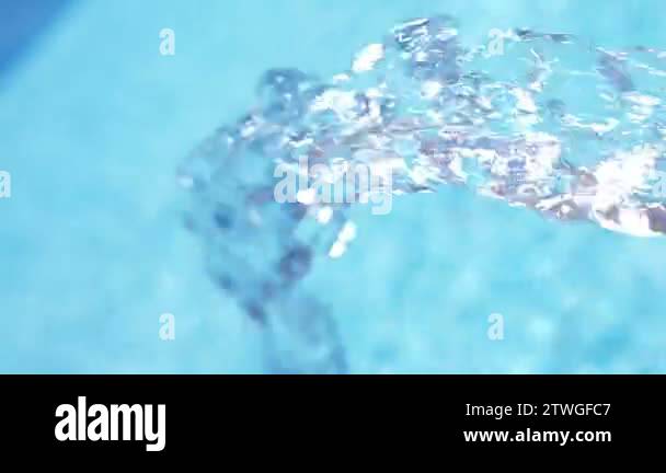 Pool Water Background Loop. 4k, close-up. water flows into the pool ...
