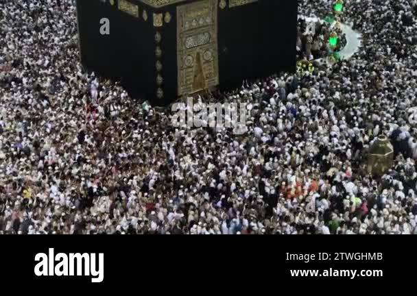 Muslim pilgrims circumambulate (tawaf) Kaaba on in Makkah, Saudi Arabia ...
