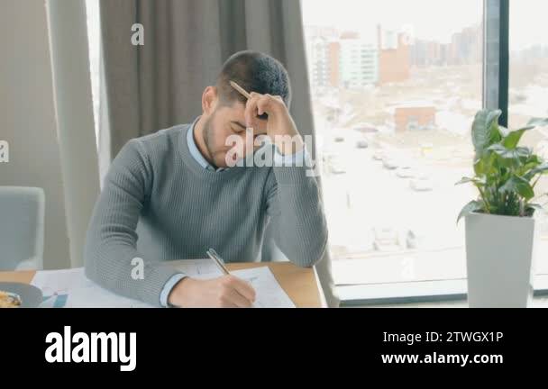 Portrait professional working on graphs Stock Videos & Footage - HD and ...