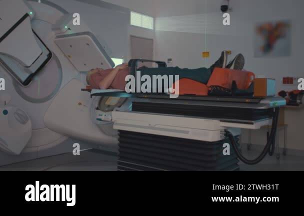 Patient Getting Radiation Therapy Treatment Inside A Modern ...