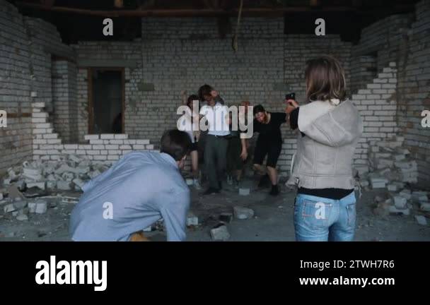 A zombie attack on the top floor of abandoned building. Survivors ...
