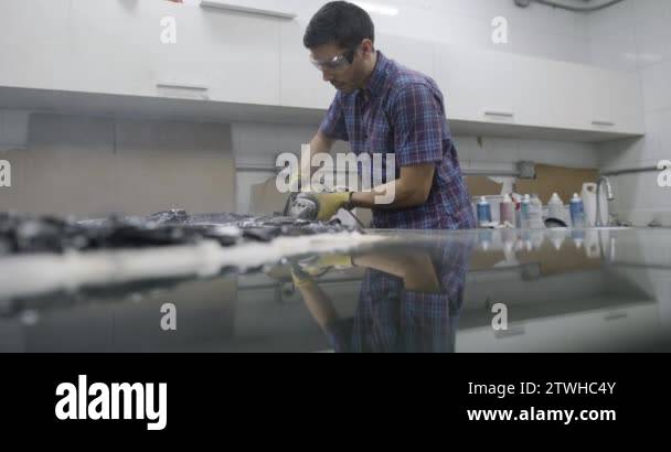 People at work in architecture design studio with plastic model and ...