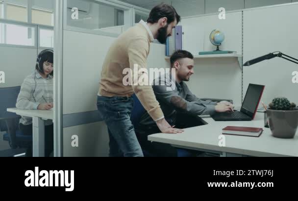 Working day in the office , manager supporting his worker and happy ...