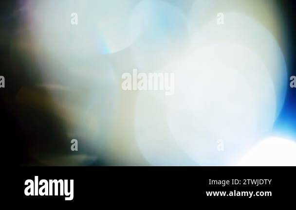 Different colored bokeh pulses ang flows in the dark, fast speed Stock ...