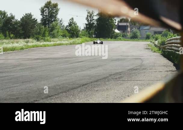 F1 racing cars taking the sharp turn Stock Video Footage - Alamy