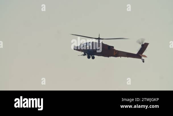 AH-64D Apache Longbow military helicopter during combat flight Stock ...