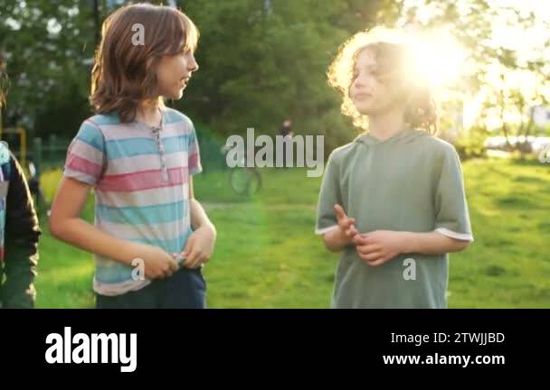 Two children school playground talking Stock Videos & Footage - HD and ...