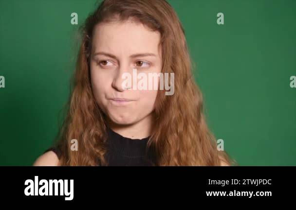 Young angry woman on green screen background Stock Video Footage - Alamy