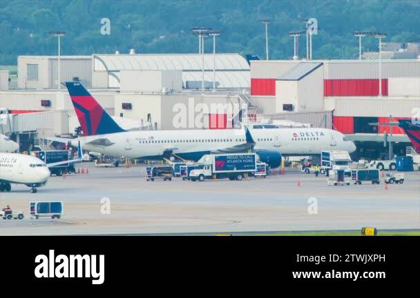 Atlanta Airport Terminal Activity featuring Delta Airlines Commercial ...