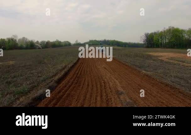 tractor on the field aerial view, 4k aerial view of tractor of Tractor ...